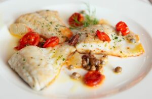 Recette : filet de perche à la puttanesca en papillotte